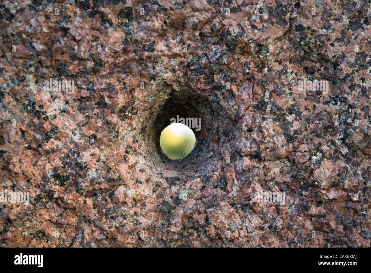 Abstract hole of mill stone Stock Photo - Alamy