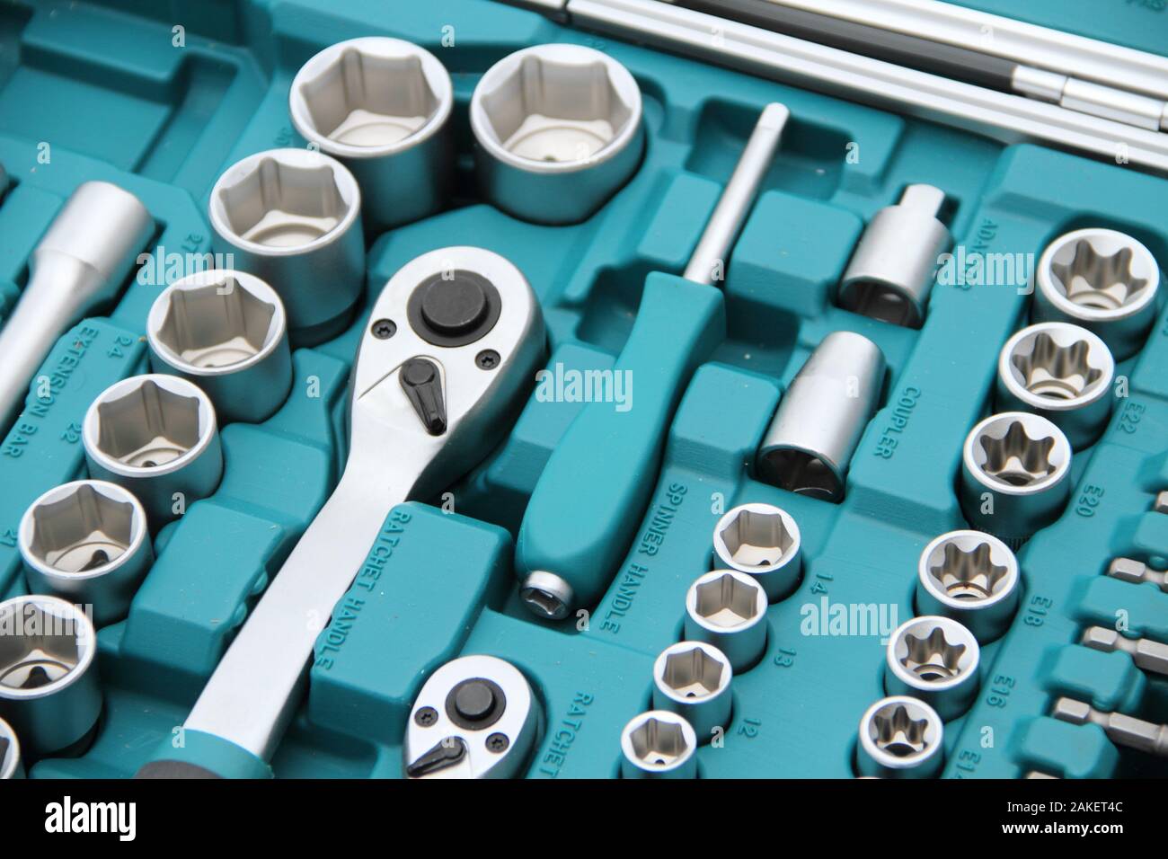 a fully stocked ratchet box with various bits and nuts Stock Photo - Alamy