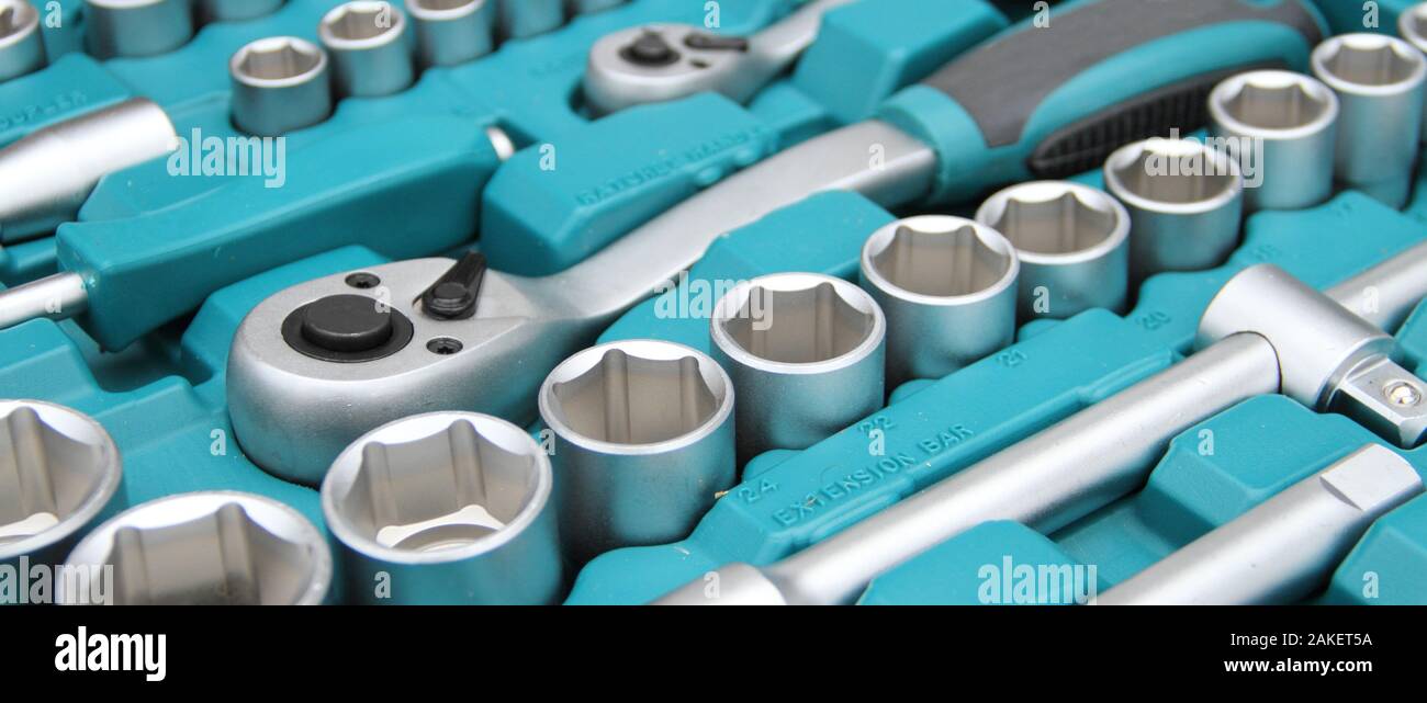 a fully stocked ratchet box with various bits and nuts Stock Photo - Alamy