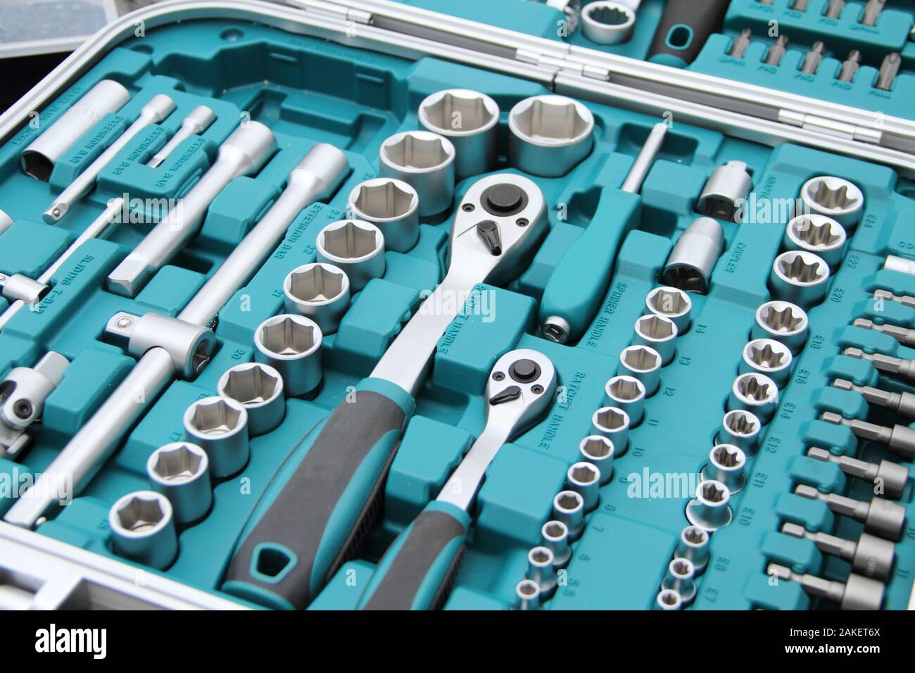 a fully stocked ratchet box with various bits and nuts Stock Photo - Alamy