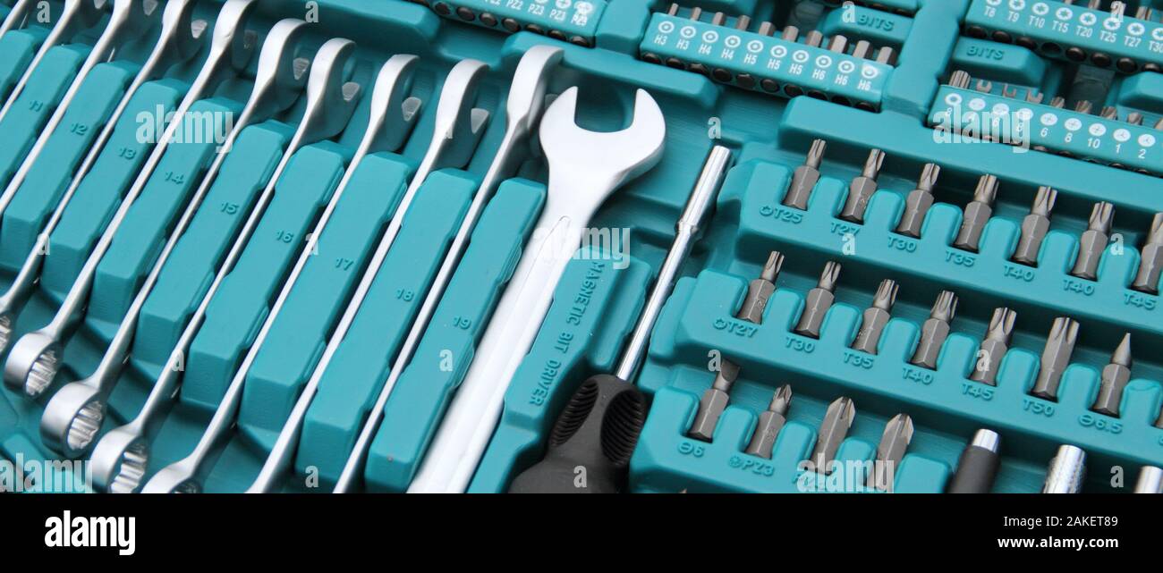 a fully stocked ratchet box with various bits and nuts Stock Photo - Alamy