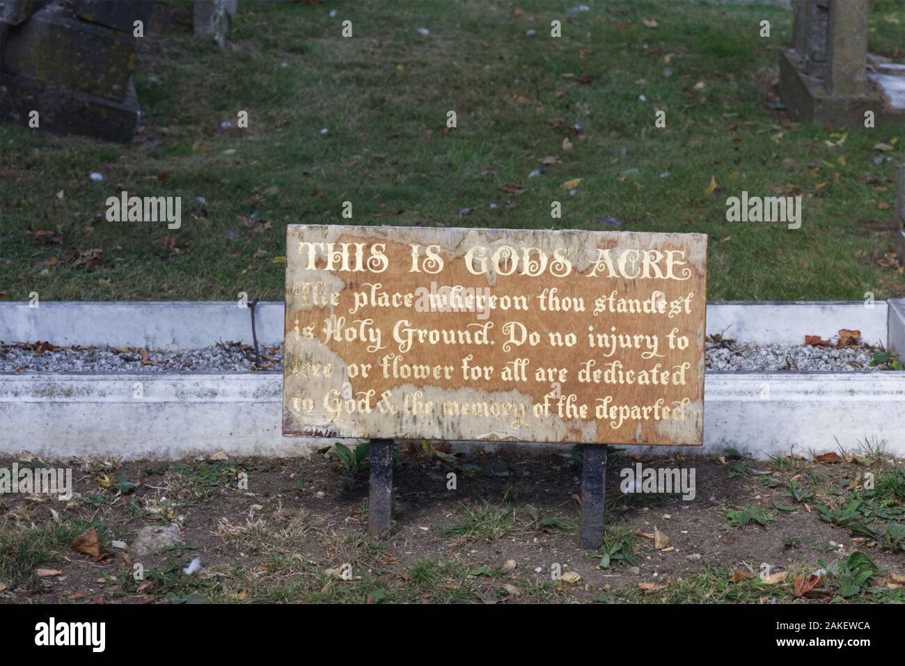 This is Gods acre wooden sign in a graveyard Stock Photo - Alamy
