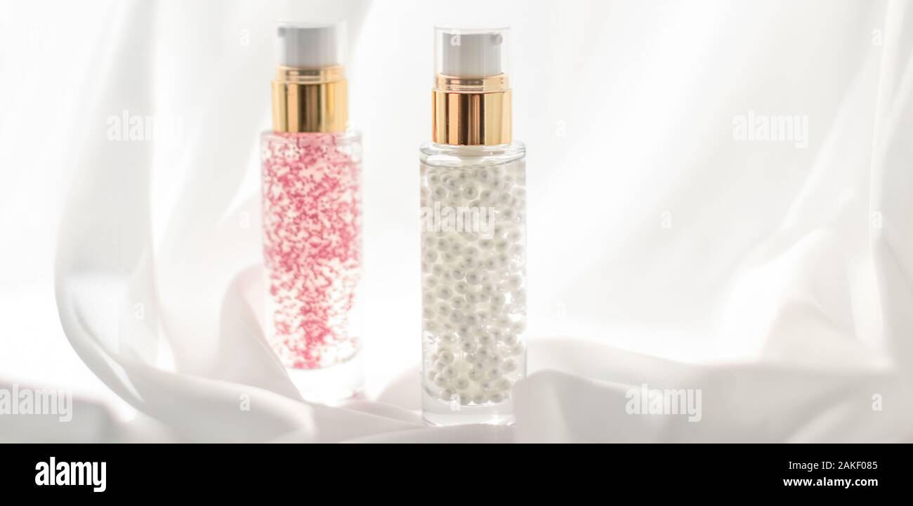 Cosmetic branding, moisture and spa concept - Skincare serum and make ...