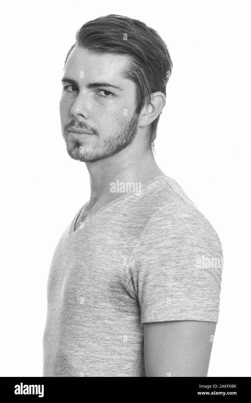 Portrait of young handsome bearded man in black and white Stock Photo ...