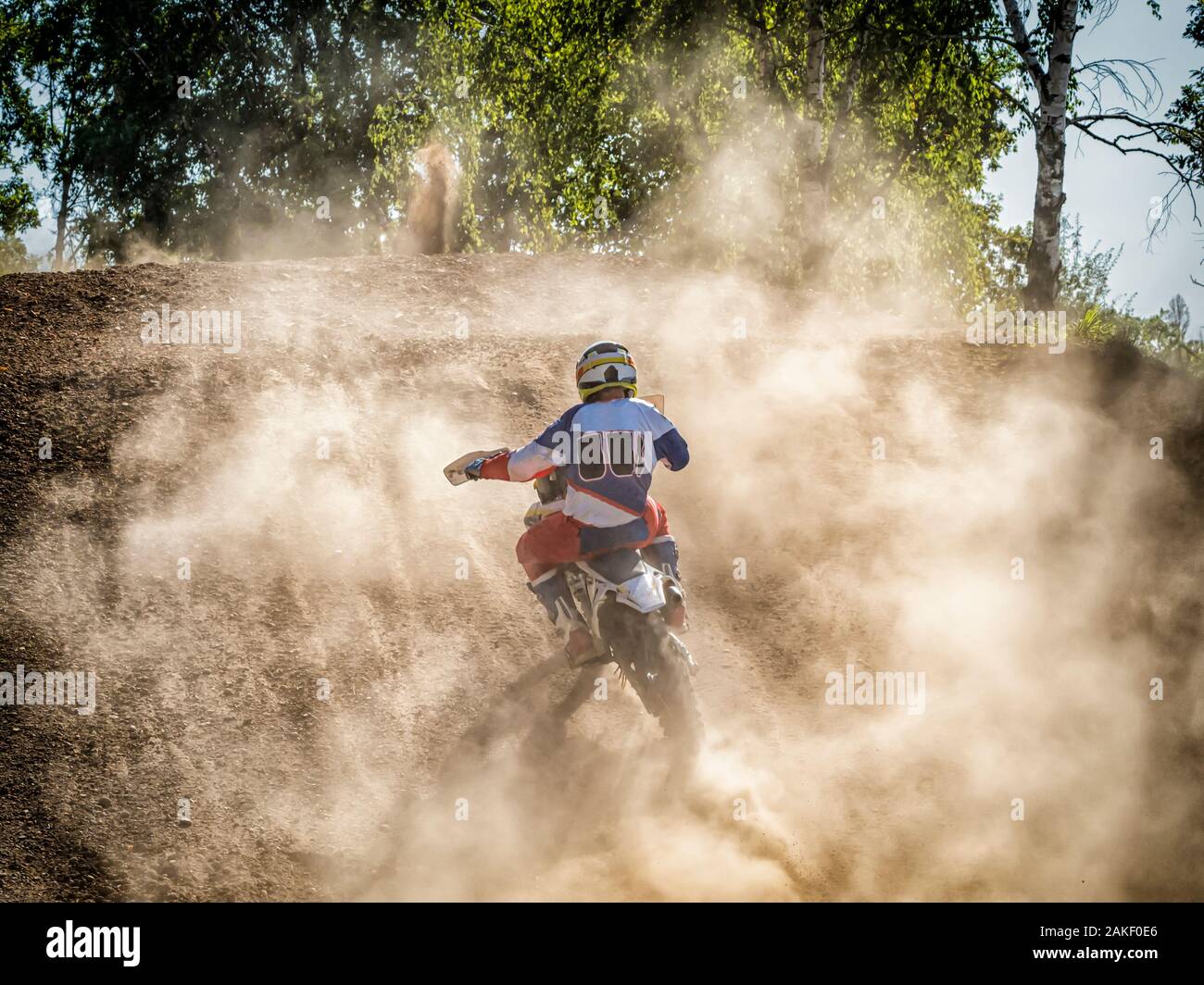 Motocross scene on a trail Stock Photo - Alamy