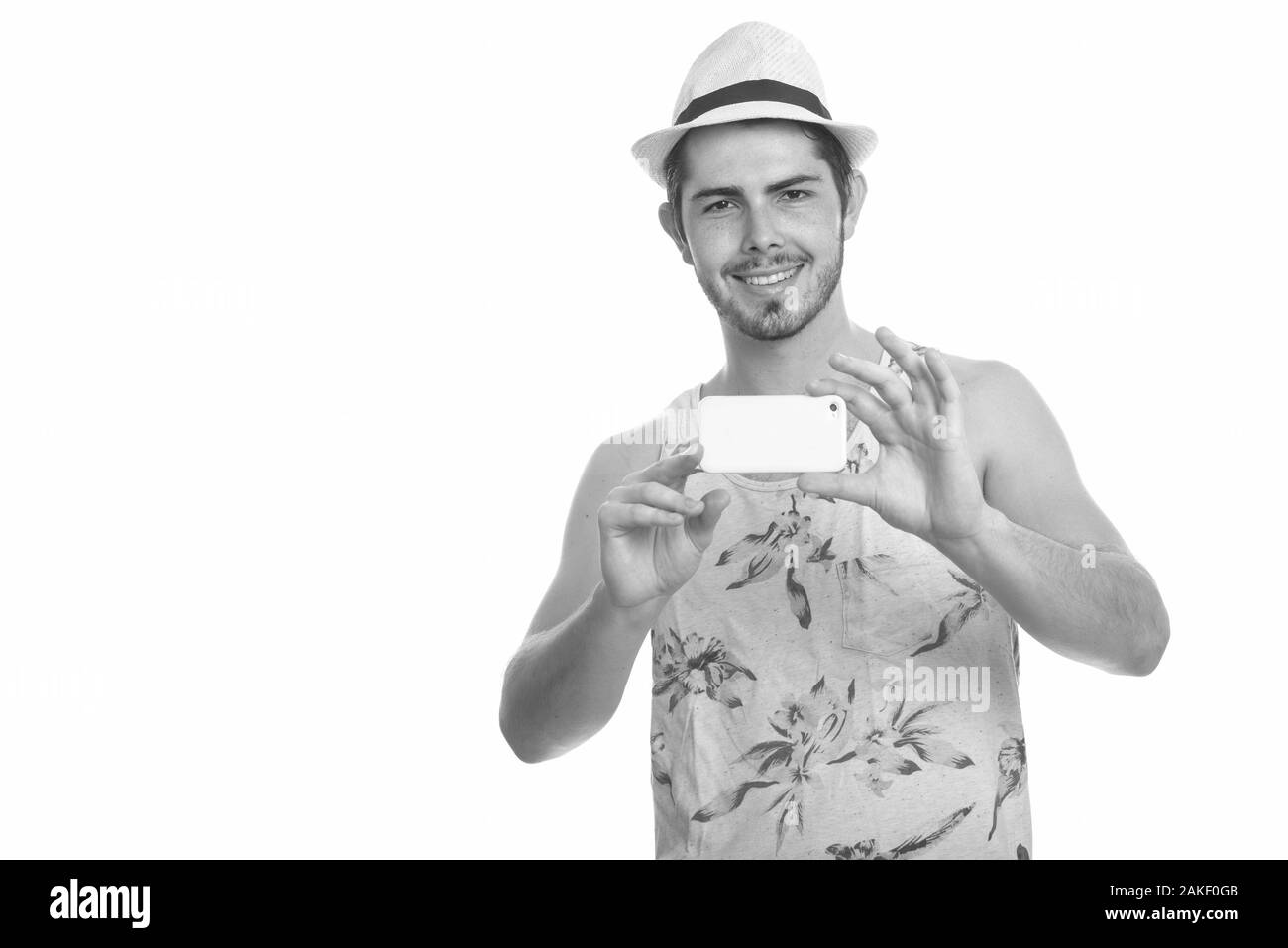 Portrait of young handsome bearded man in black and white Stock Photo ...