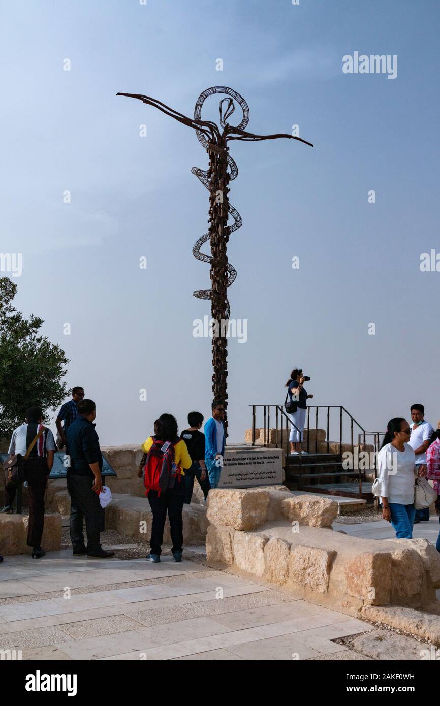Snake on cross hi-res stock photography and images - Alamy