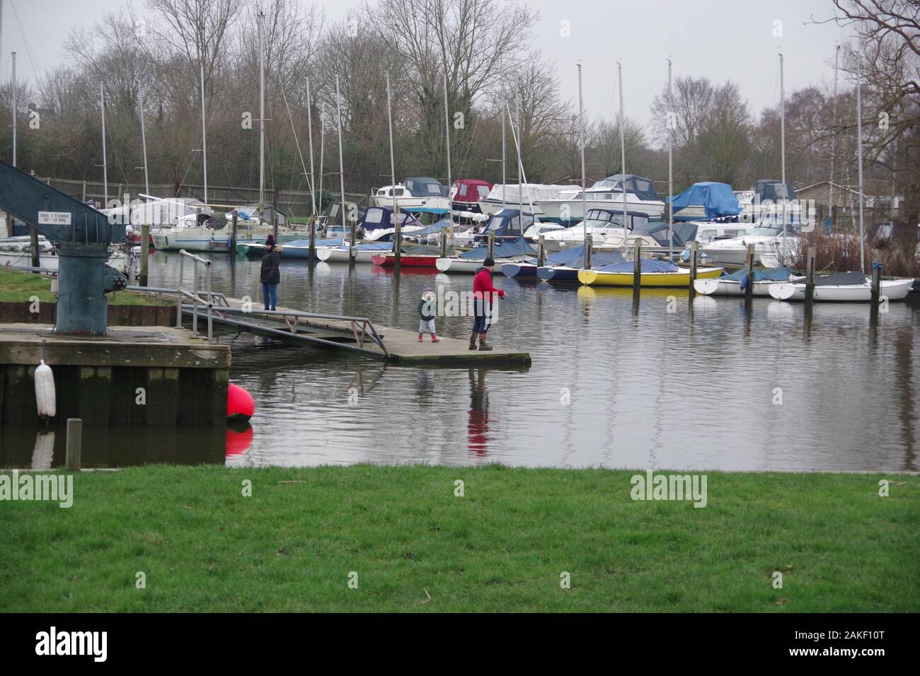 fishing lesson at boating lake Stock Photo - Alamy