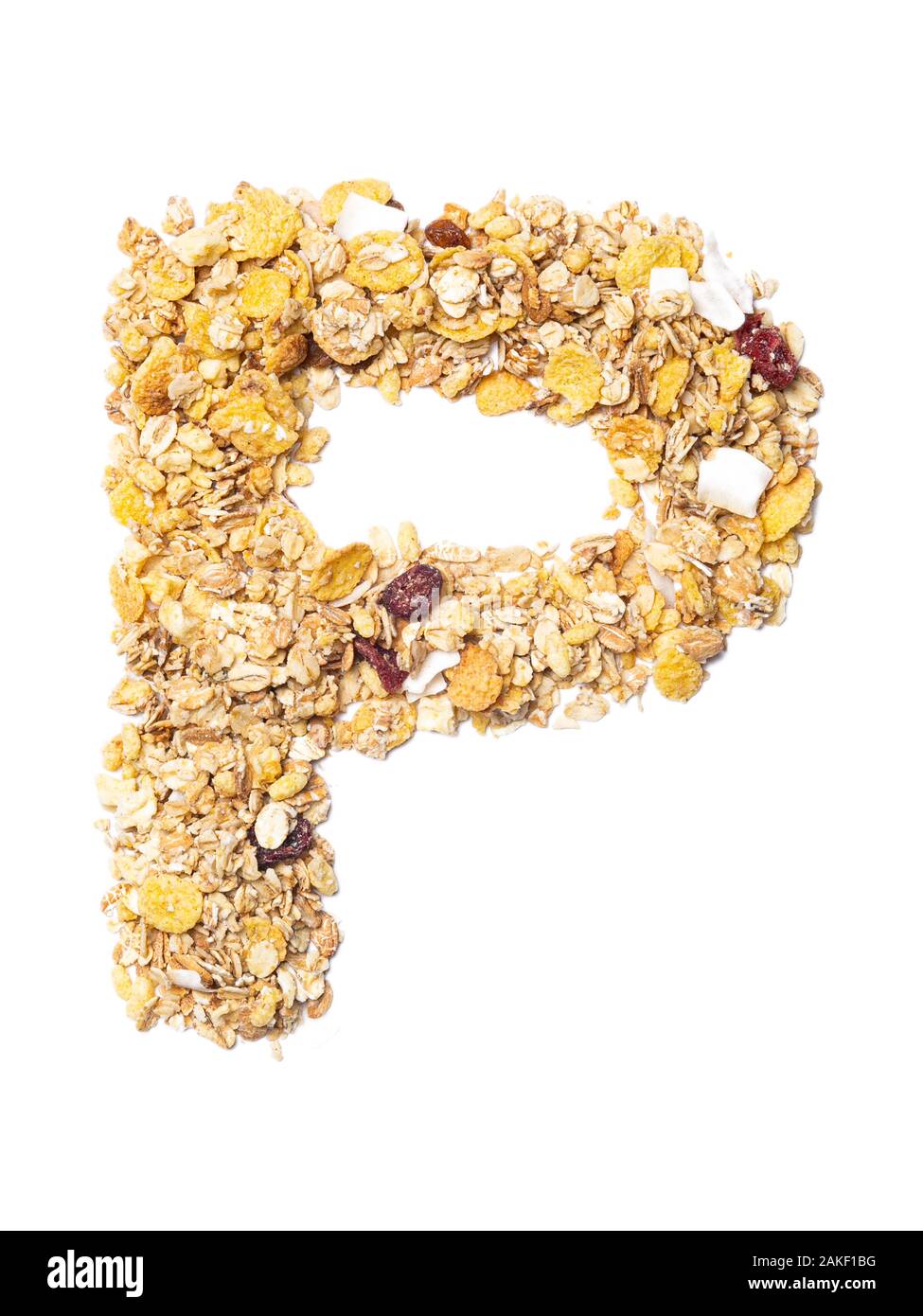 Letter P of the English alphabet muesli with coconut, berries, raisins ...
