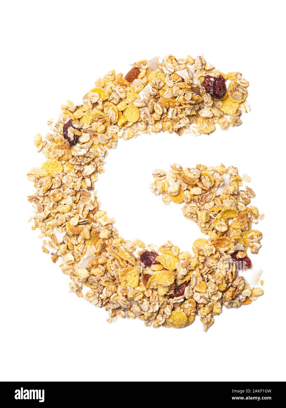 Letter G of the English alphabet muesli with coconut, berries, raisins ...