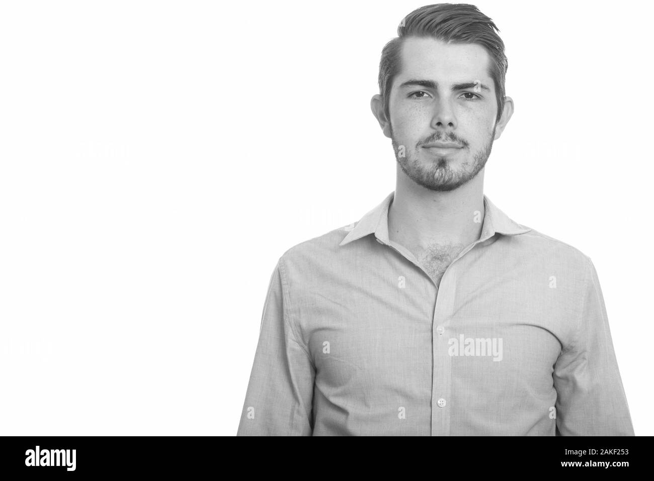 Portrait of young handsome bearded man in black and white Stock Photo ...