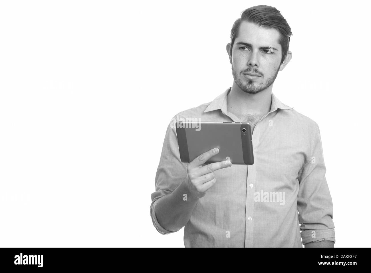 Portrait of young handsome bearded man in black and white Stock Photo ...