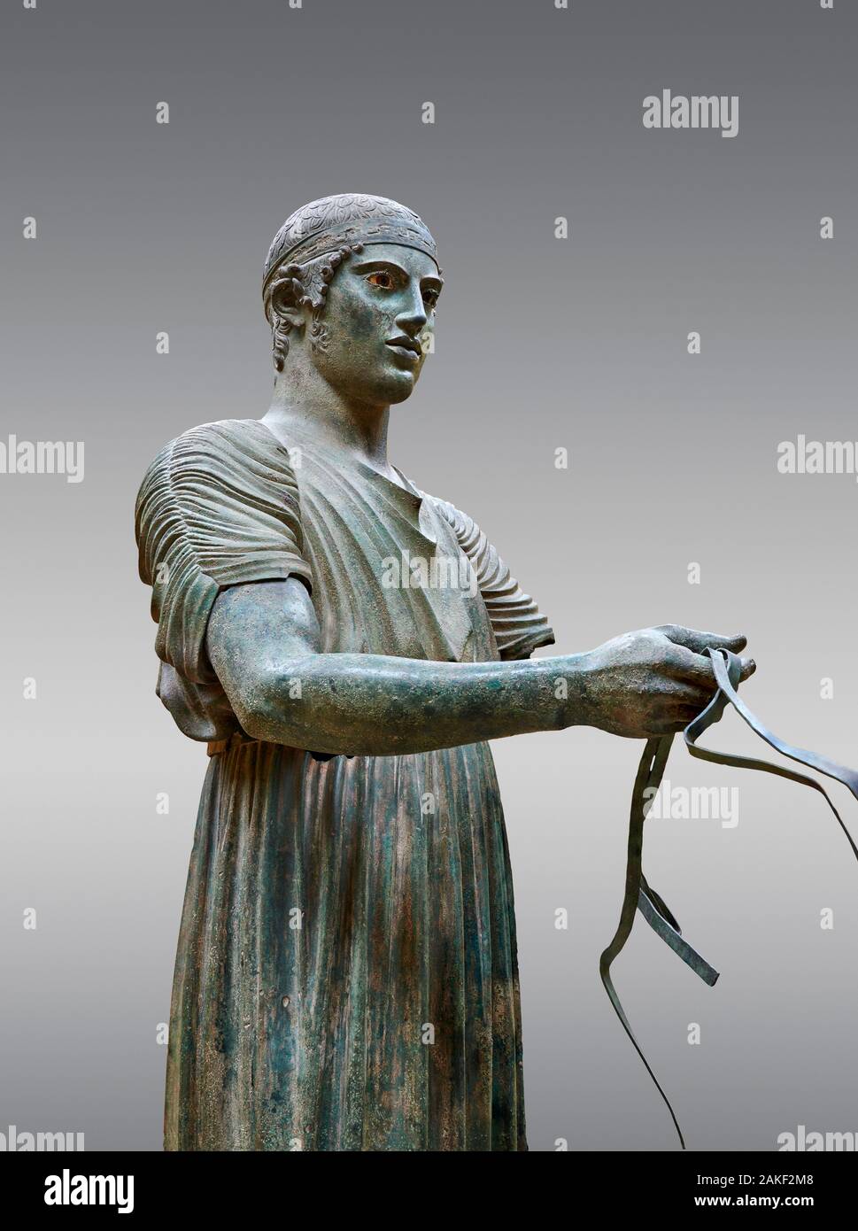 Severe Style Ancient Greek bronze sculpture of a charioteer, 480-460 BC ...