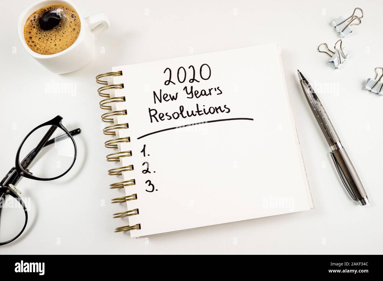 New year resolutions 2020 on desk. 2020 goals list with notebook ...