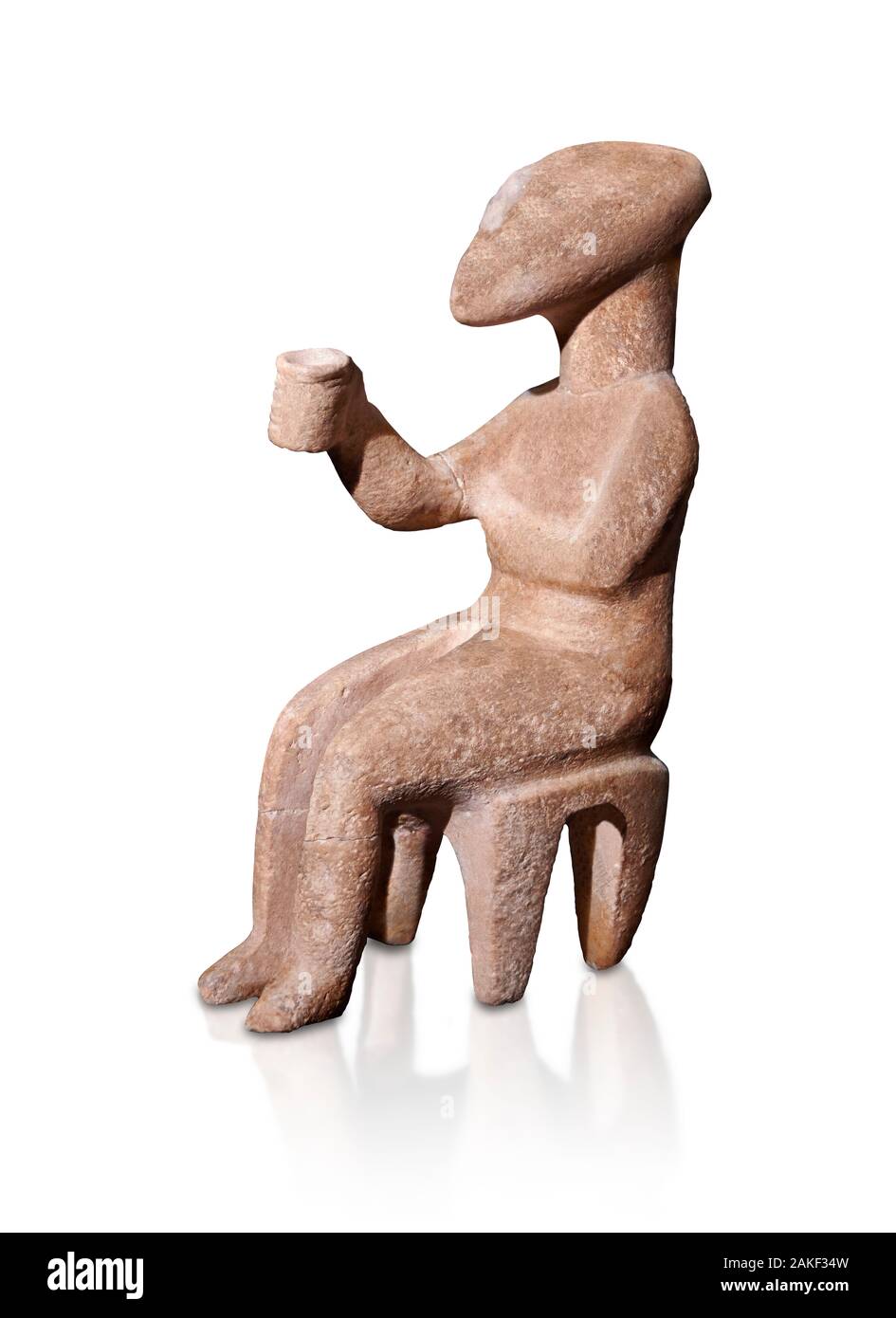 Rare male Cycladic statue of a seated warrior or hunter holding a cup ...