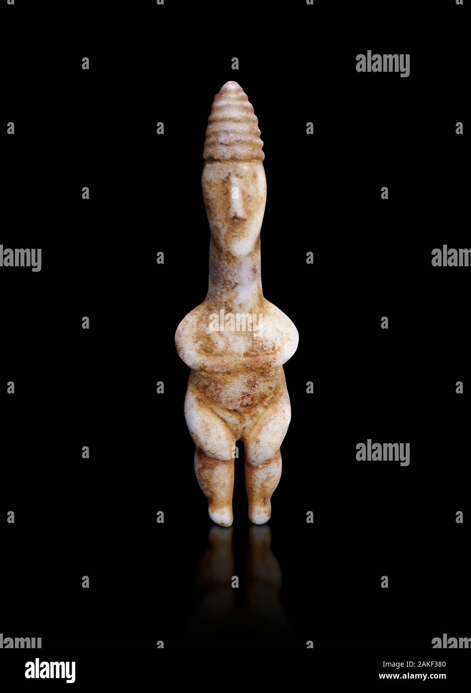 Marble ancient Greek Cycladic figurine wearing a conical pilos, early ...