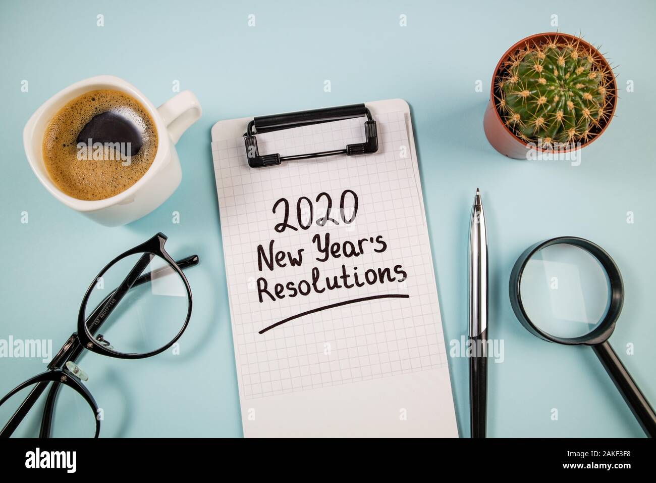 New year resolutions 2020 on desk. 2020 goals list with notebook ...