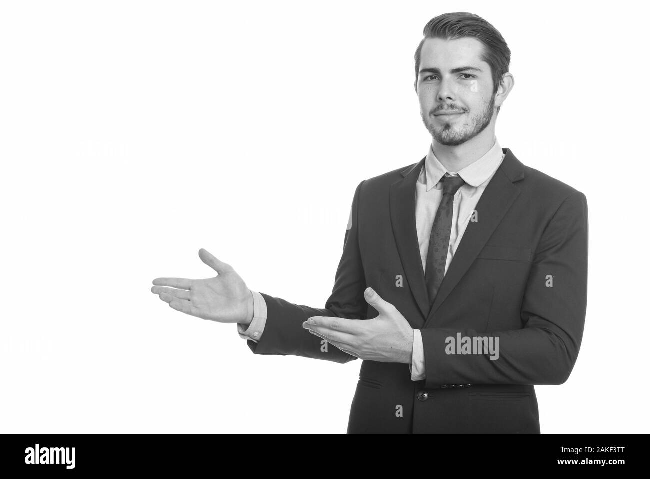 Presenting man in white Cut Out Stock Images & Pictures - Alamy