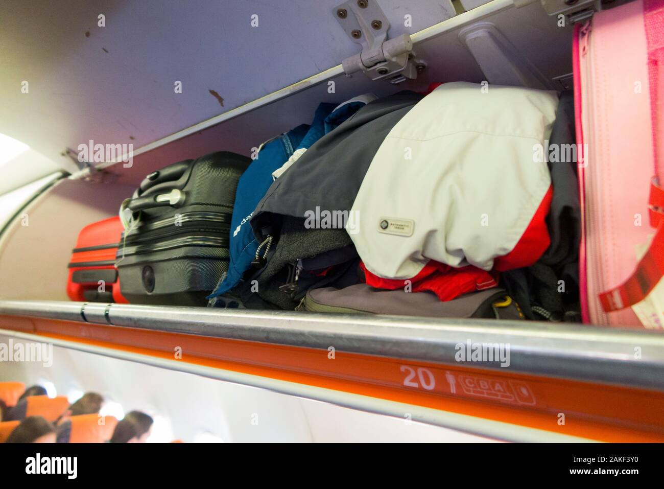 Airplane Overhead Bins High Resolution Stock Photography and Images - Alamy