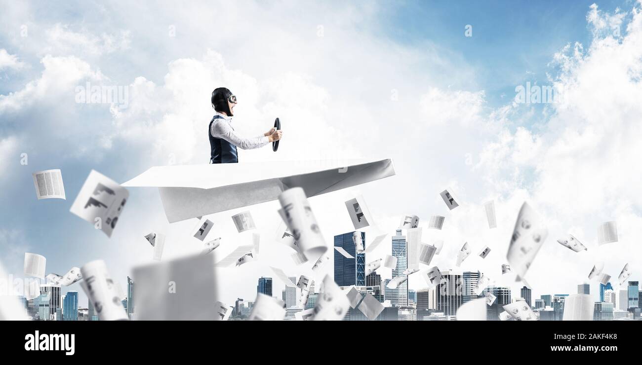 Creative business process concept with funny pilot Stock Photo - Alamy