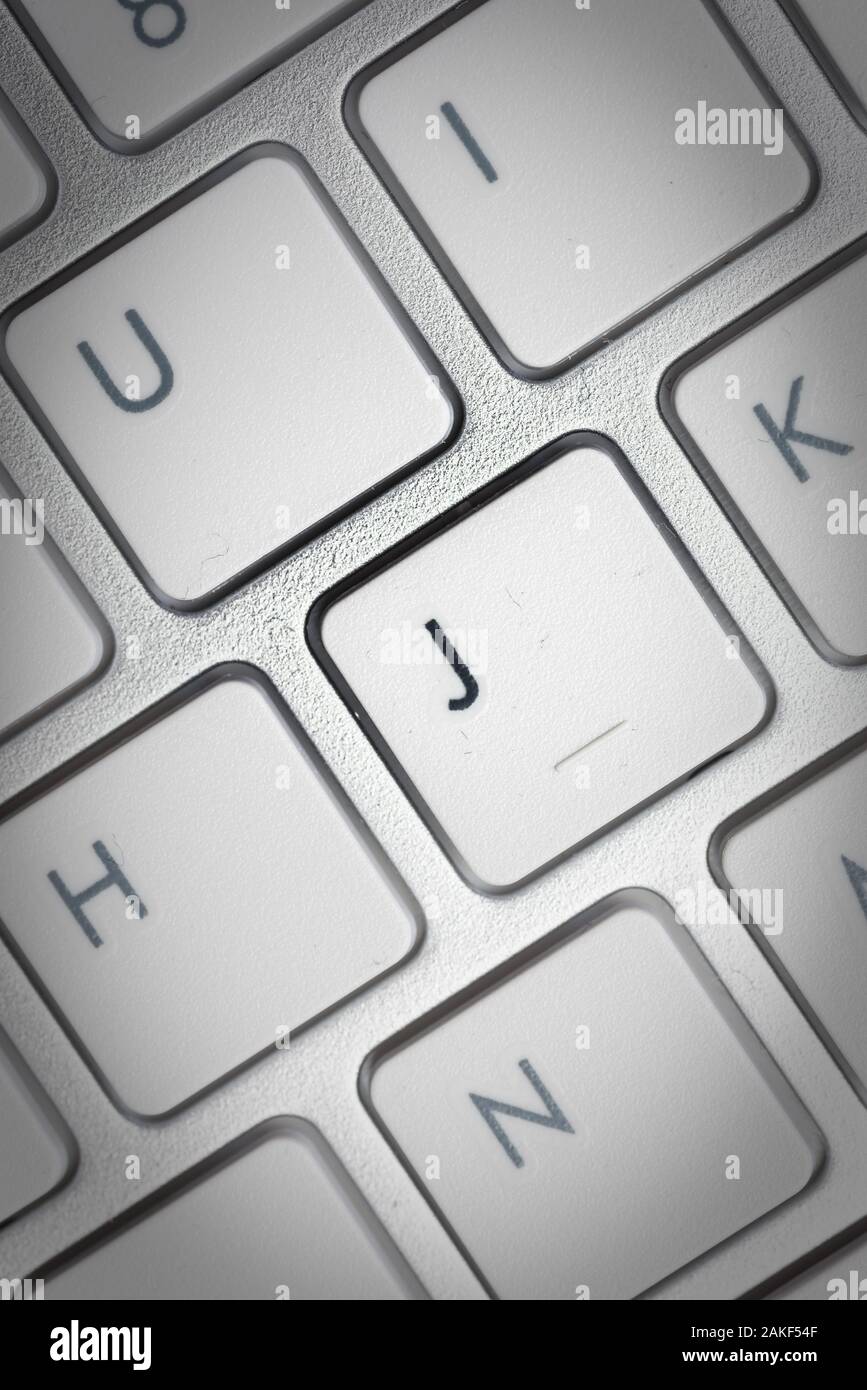 Computer keyboard - silver keyboard of a laptop with button J isolated ...
