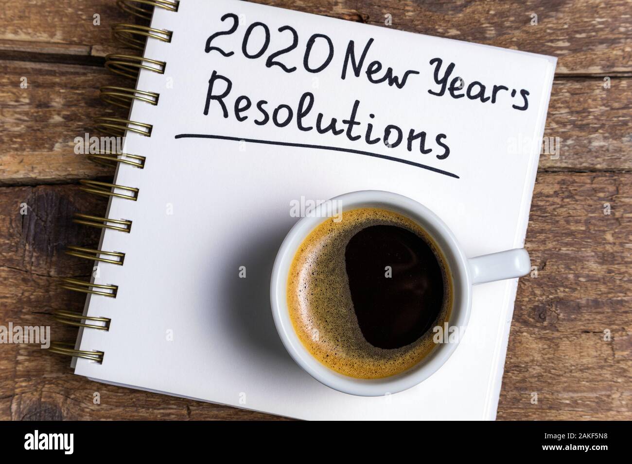 New year resolutions 2020 on desk. 2020 goals list with notebook ...