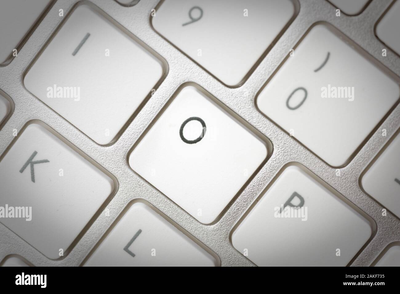 Computer keyboard - silver keyboard of a laptop with button O isolated ...