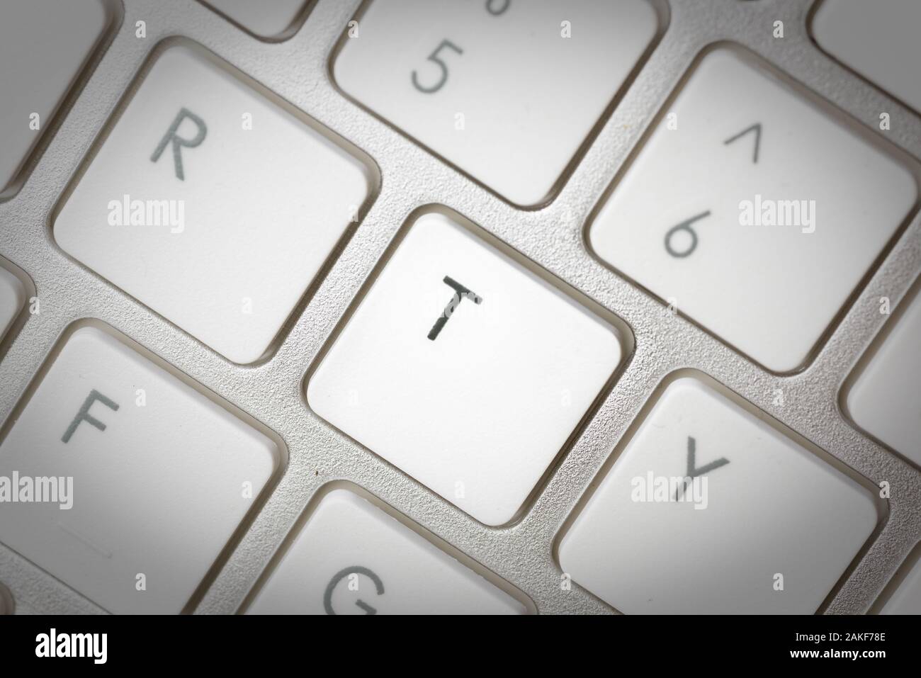 Computer keyboard - silver keyboard of a laptop with button T isolated ...