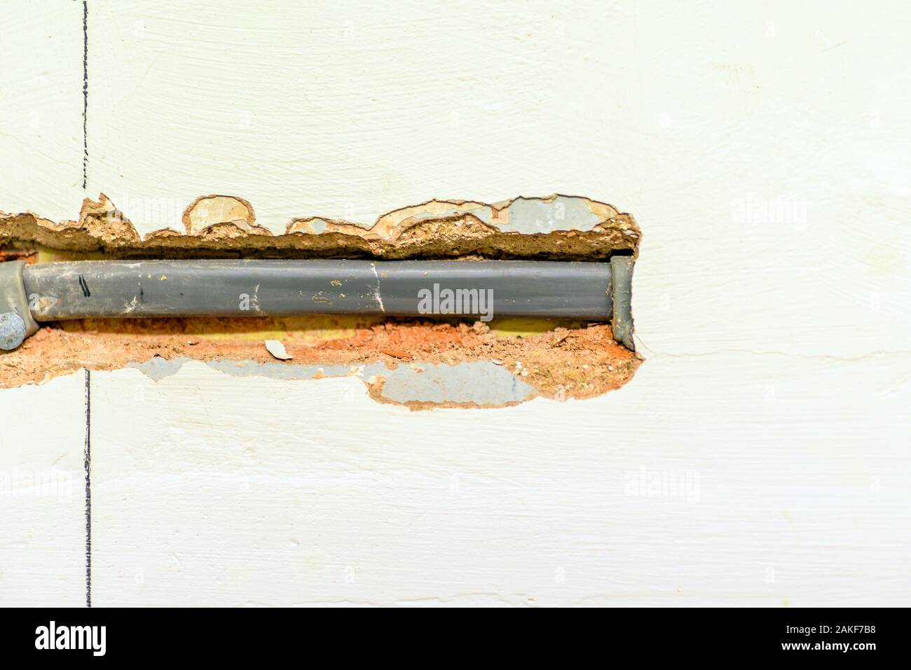 electric wires in a wall during renovation in england uk Stock Photo ...