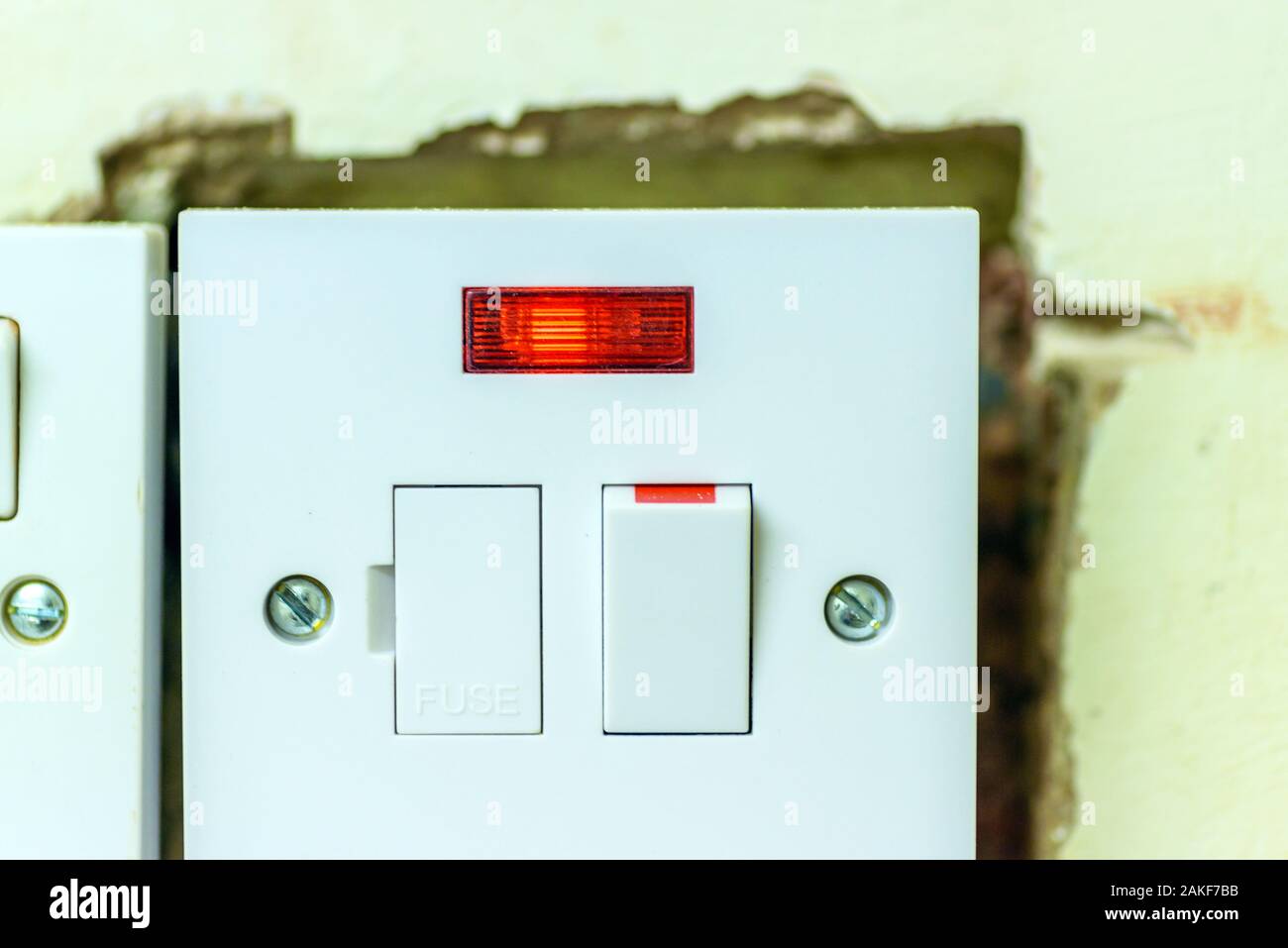 electric socket in a wall during renovation in england uk Stock Photo ...