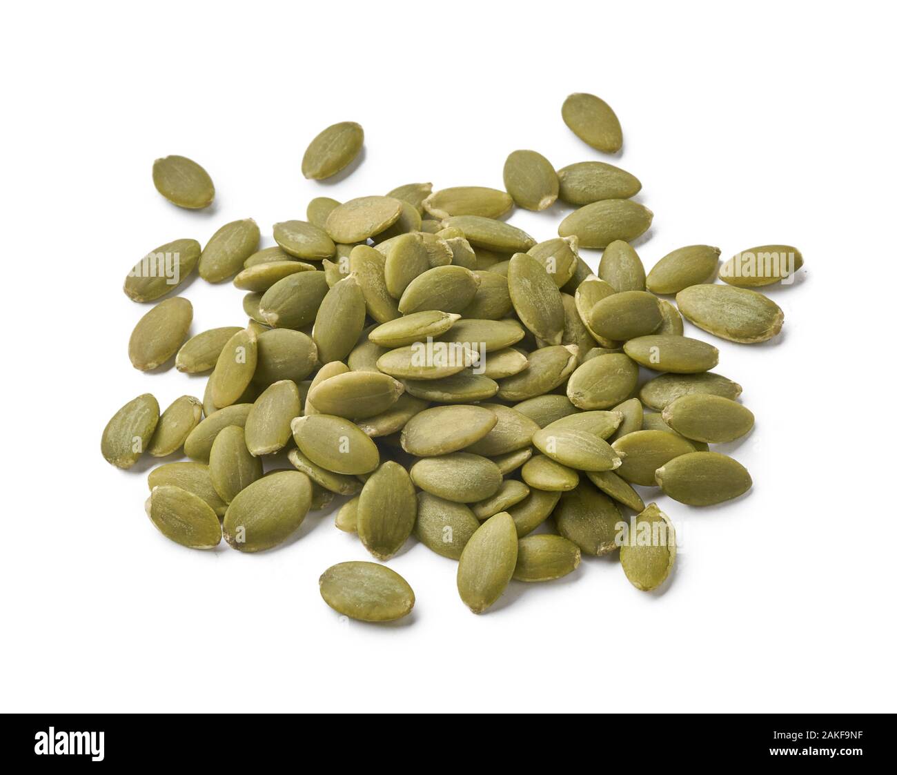 A pile of peeled pumpkin seeds isolated on white background Stock Photo ...
