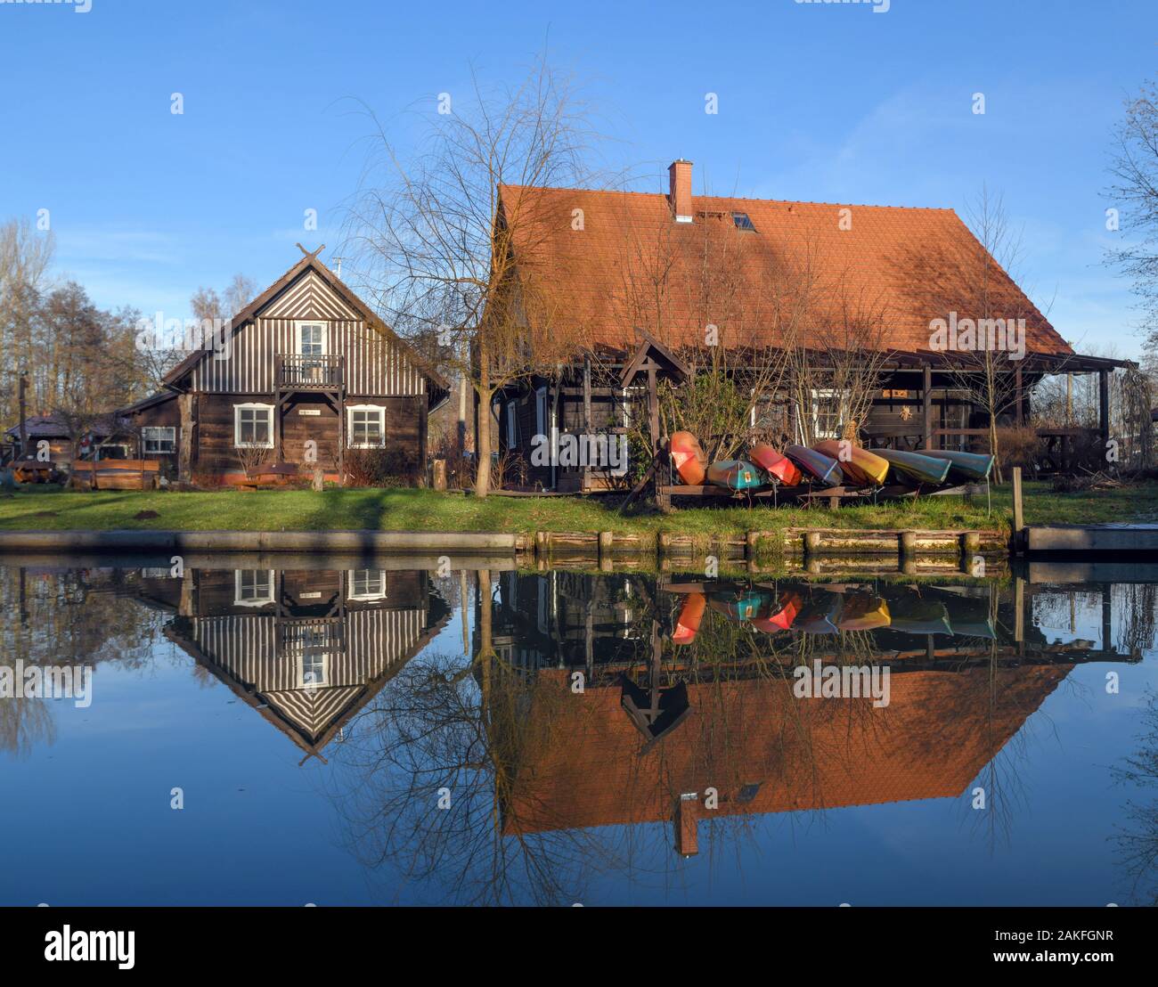 Leipe, Germany. 02nd Jan, 2020. Canoes lie on the banks of a river in ...