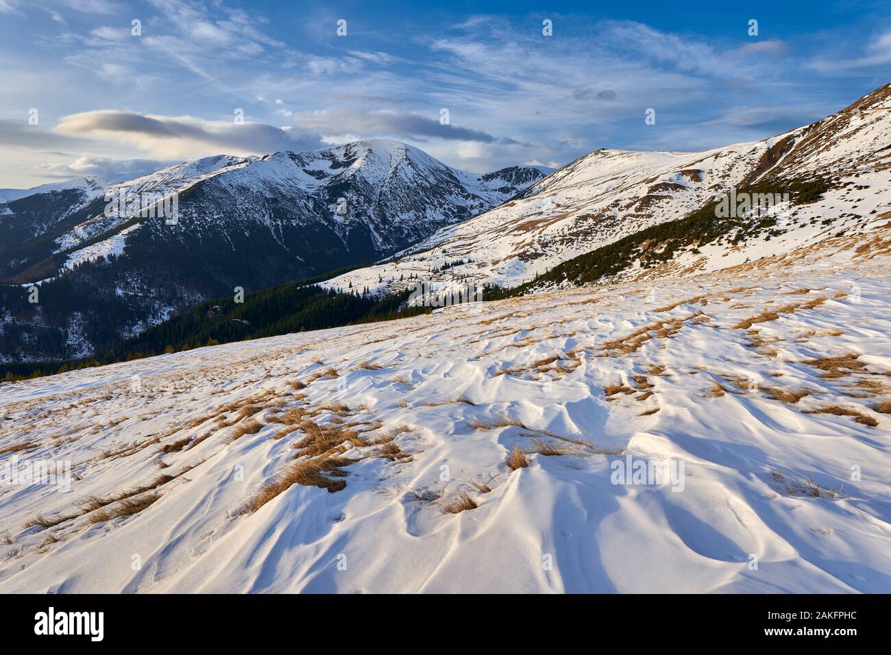 Mountain range in the early spring with snow Stock Photo - Alamy