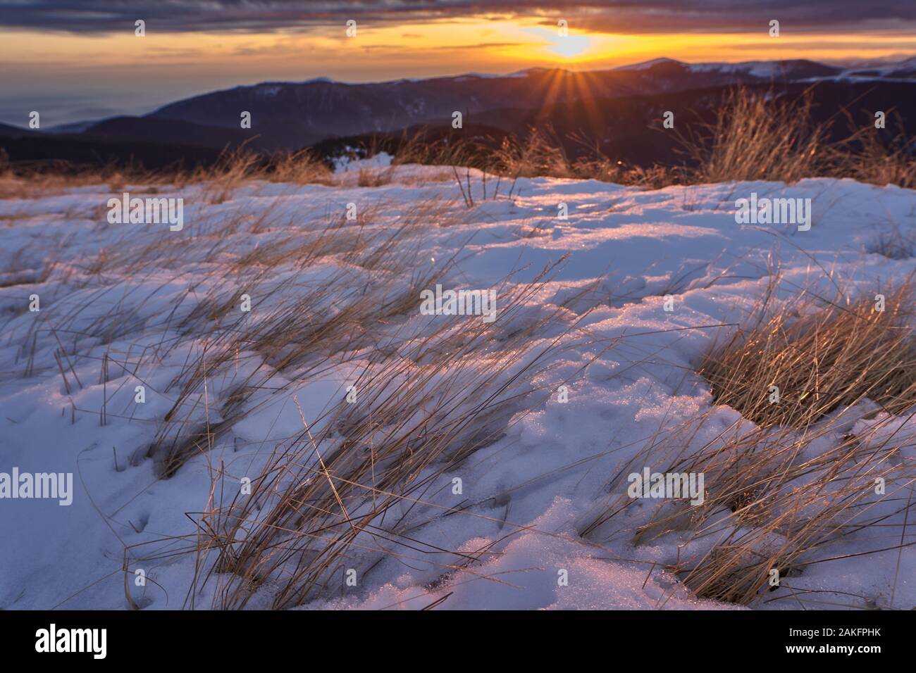 Mountain range in the early spring with snow Stock Photo - Alamy