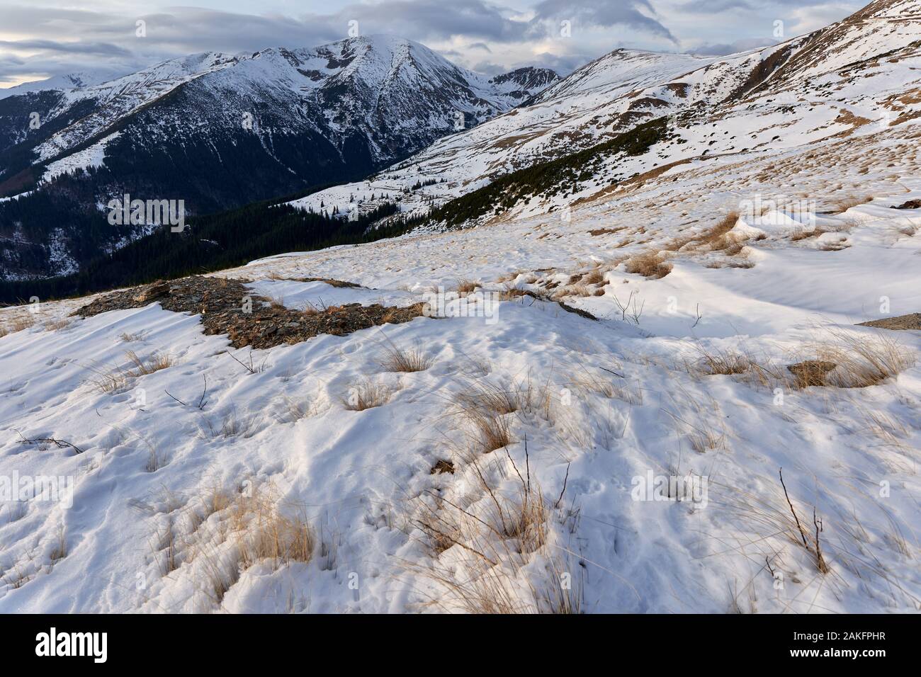 Mountain range in the early spring with snow Stock Photo - Alamy