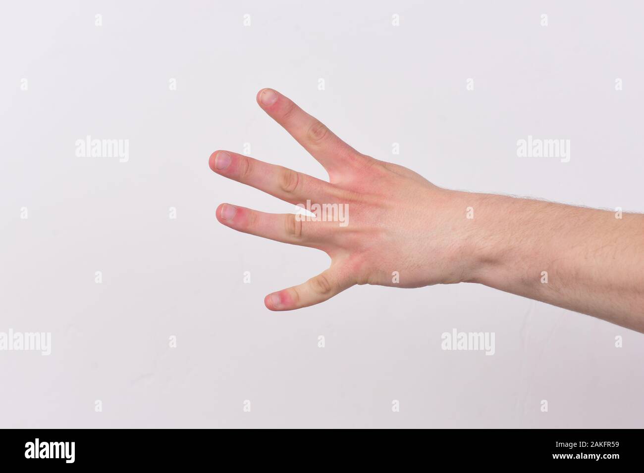 Hand isolated on light grey background, copy space. Count down and ...