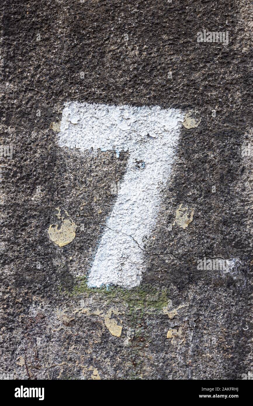 Number 7, seven, street number sign on the wall Stock Photo - Alamy