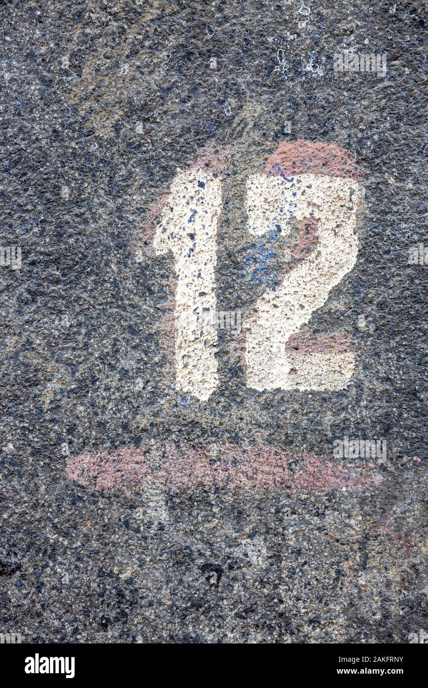 Number 12, twelve, street number sign on the wall Stock Photo - Alamy