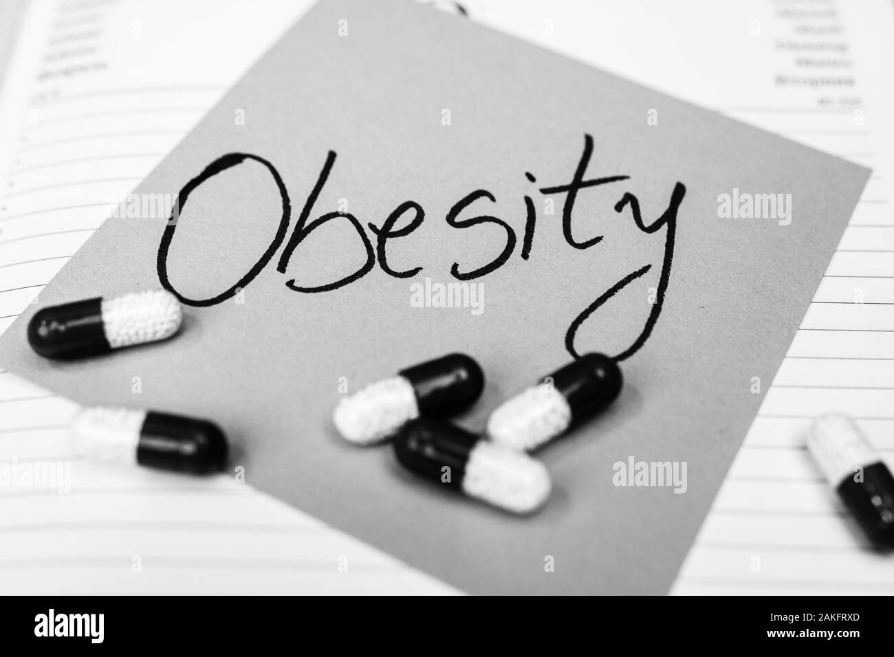 Writing Obesity memo post reminder and medicines, pills. Writing ...