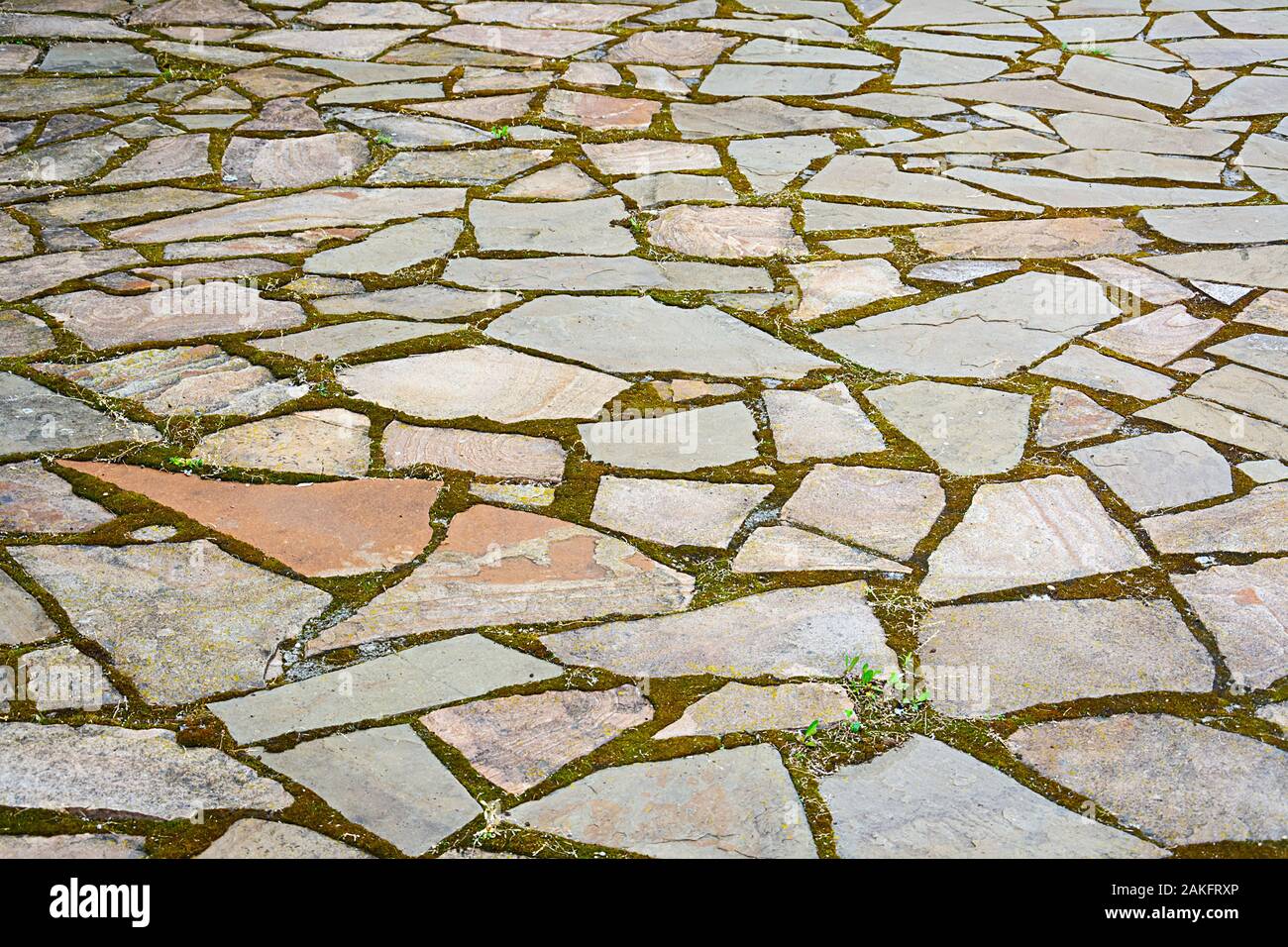 Fragment of stone pavement. Background of stone texture Stock Photo - Alamy