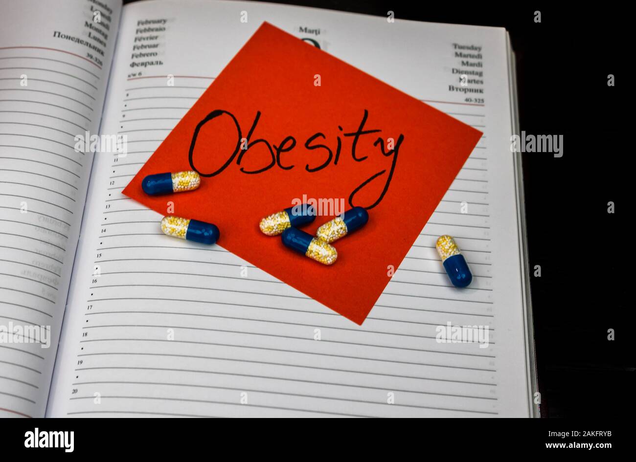 Writing Obesity memo post reminder and medicines, pills. Writing ...