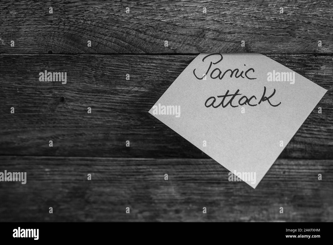 Writing Panic attack on memo post reminder. Text Panic attack on sticky ...