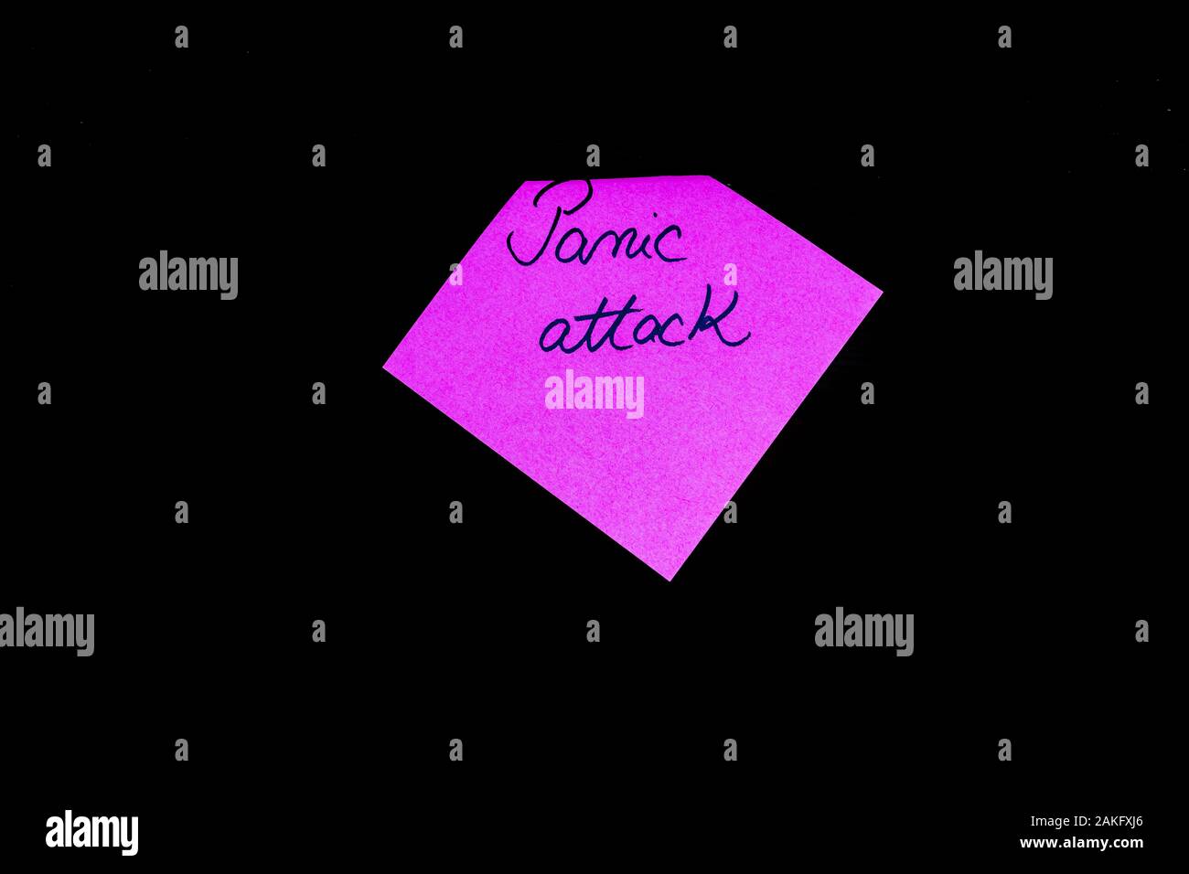 Writing Panic attack on memo post reminder. Text Panic attack on sticky ...