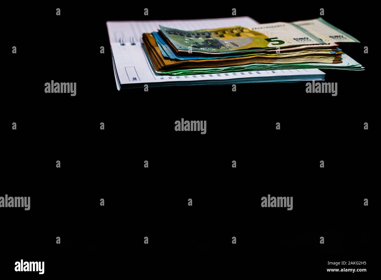 Money on the table, EURO on spiral notebook. Business concept, money ...