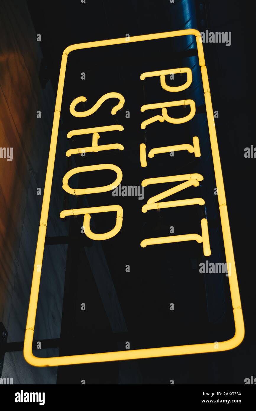 'Print Shop' yellow neon sign at the Delft University Stock Photo - Alamy