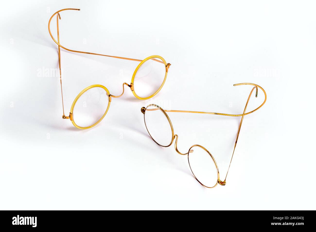 Couple of golden old fashion glasses isolated on white background Stock ...