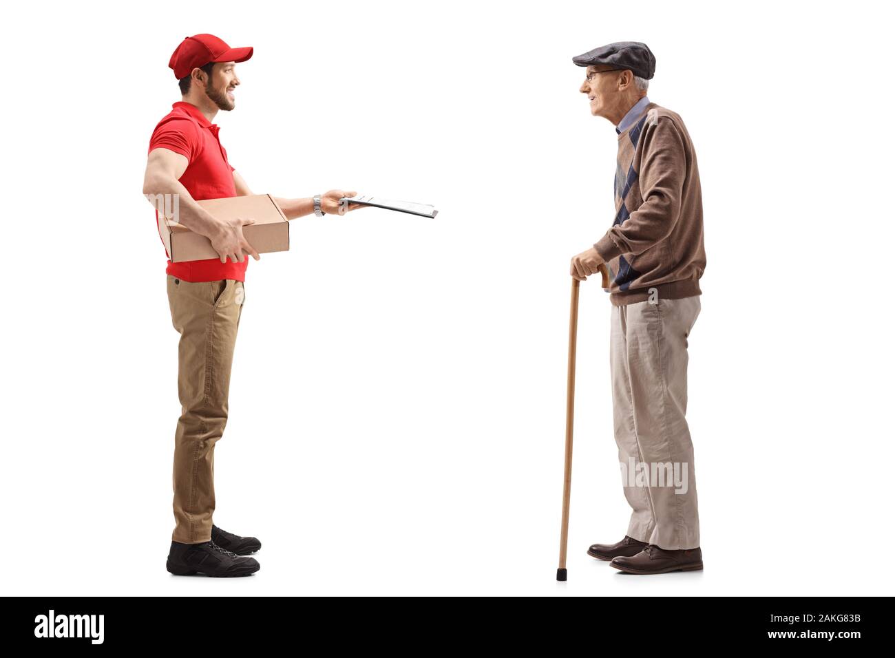 Full length portrait of a postman delivering a package to an elderly ...