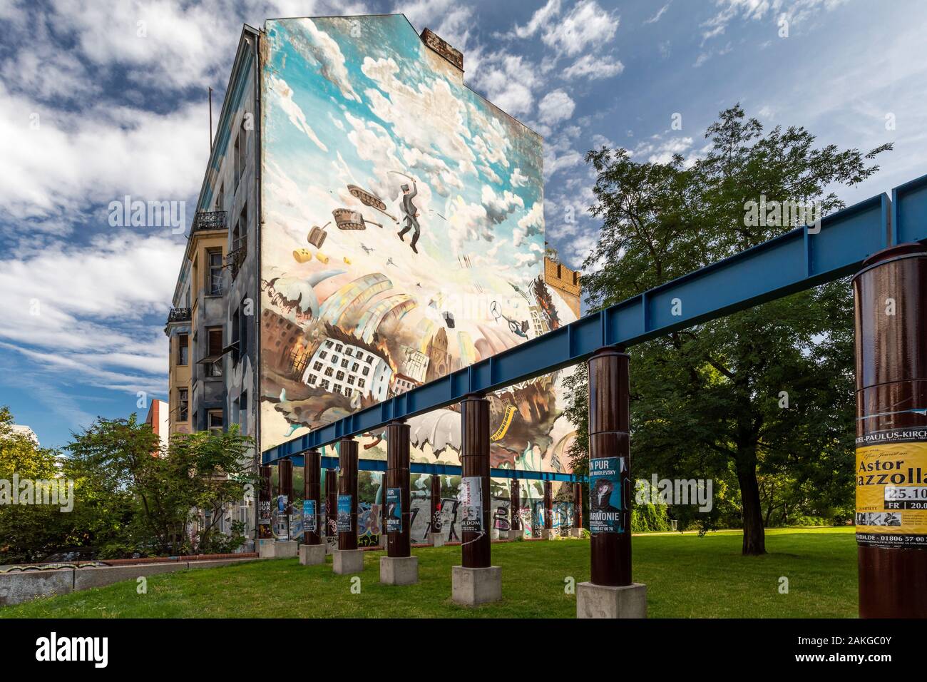 Wide angle view of a huge graffiti covering the facade of a high rise ...