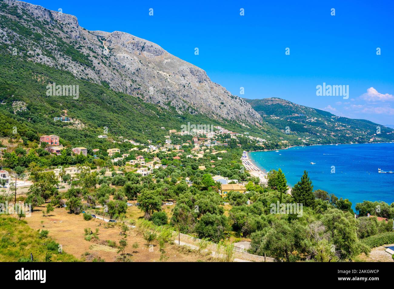 Barbati Beach with crystal clear azure water in beautiful landscape ...