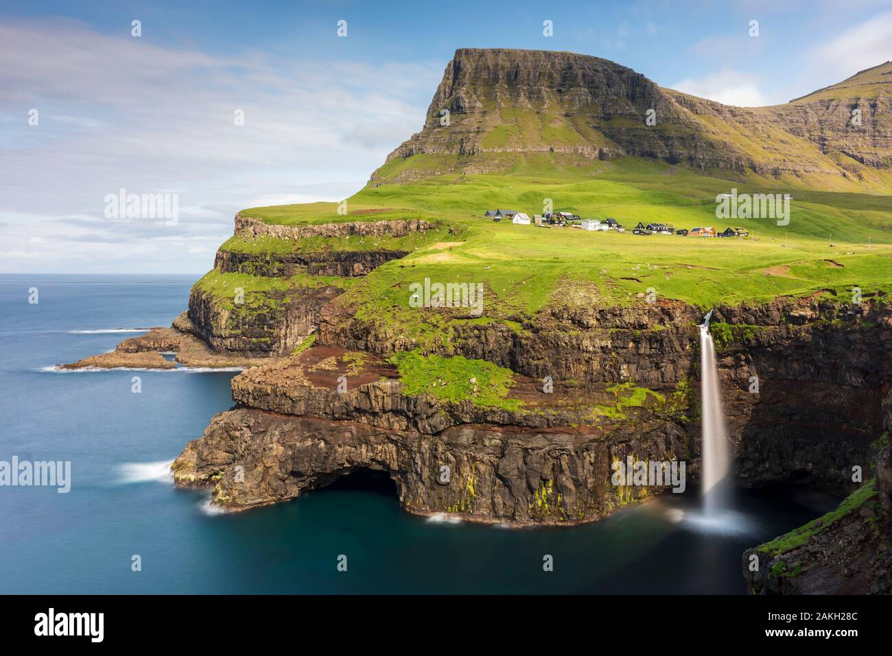 Denmark, Faroe Islands, Vagar Island, Gasadalur, village and waterfall ...